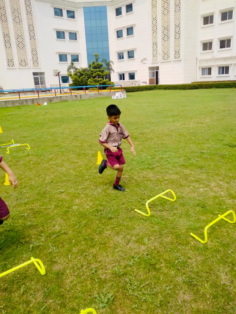 Obstacle course relay race - Florence International School
