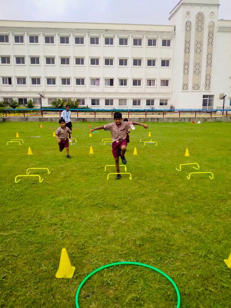 Obstacle course relay race - Florence International School